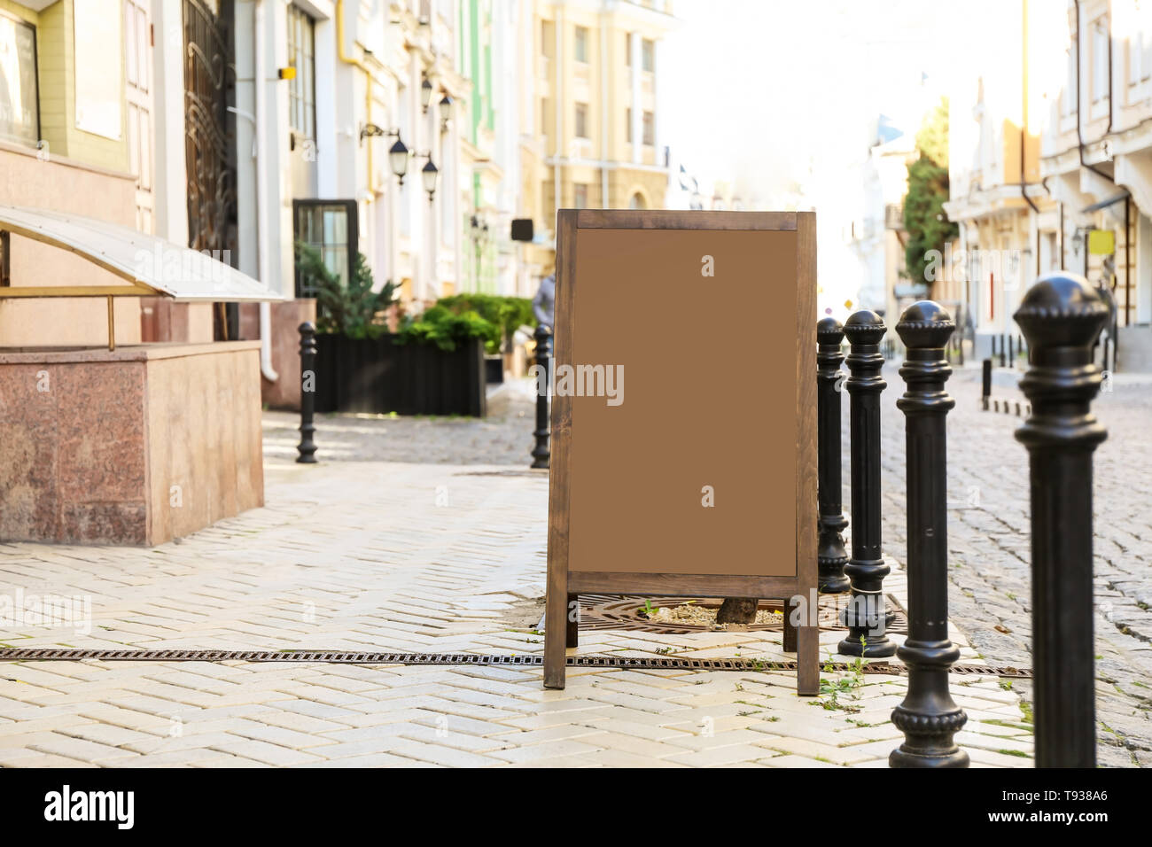 Blank advertising board on city street Stock Photo - Alamy