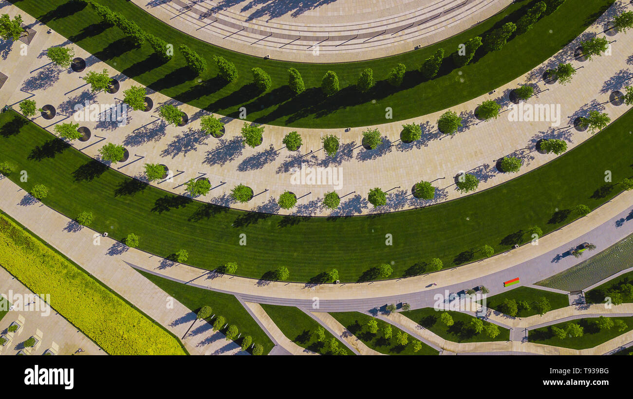 Vertical aerial top down view shot and looking down on the city park in ...