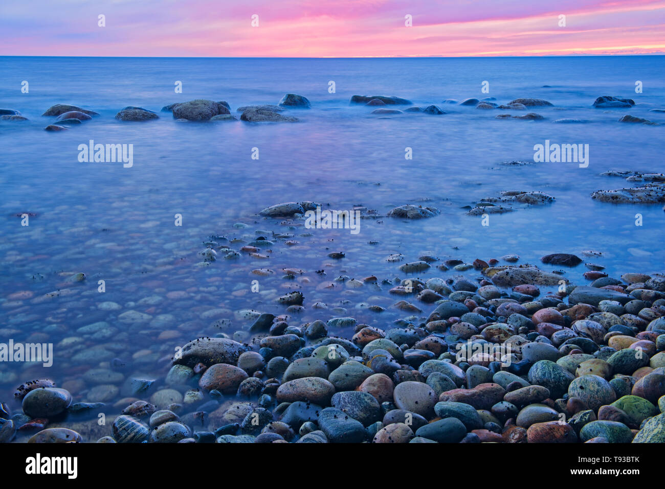View of rocks along the Gulf of St. Lawrence at dusk, Northern ...