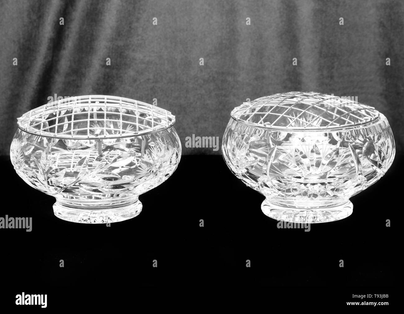 Two vintage glass rose bowls with mesh hi-res stock photography and ...