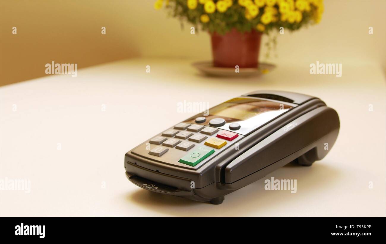 Close credit card swiping machine to pay. credit card swipe through ...