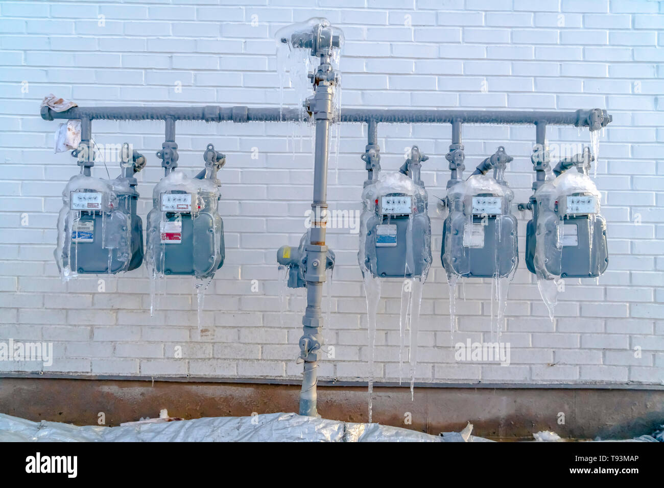 Water meters and pipes covered with ice during winter in Eagle Mountain ...
