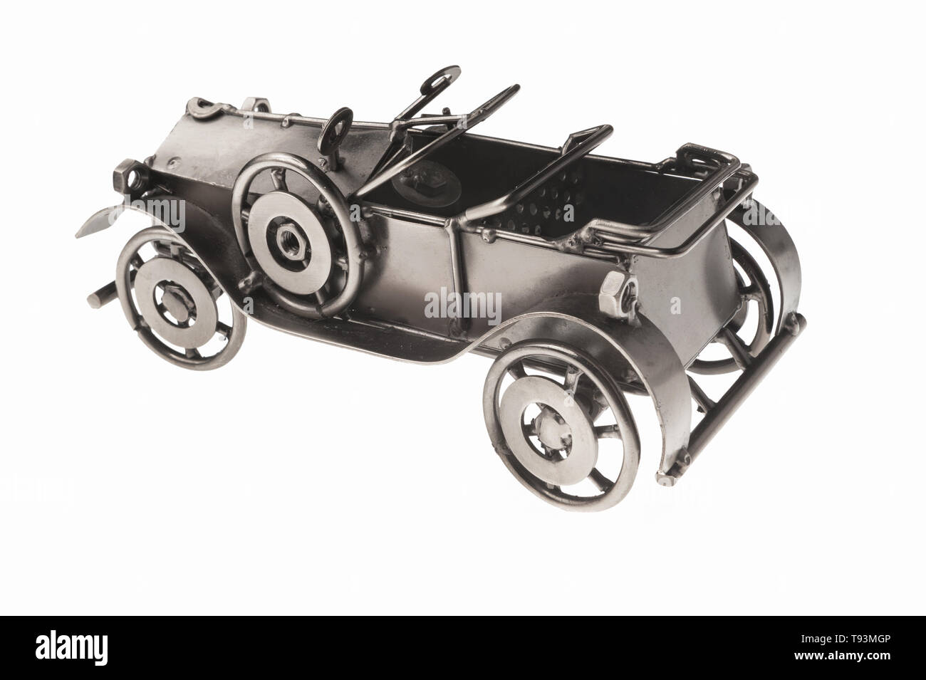 Toy steel machine isolatedon white background Stock Photo - Alamy