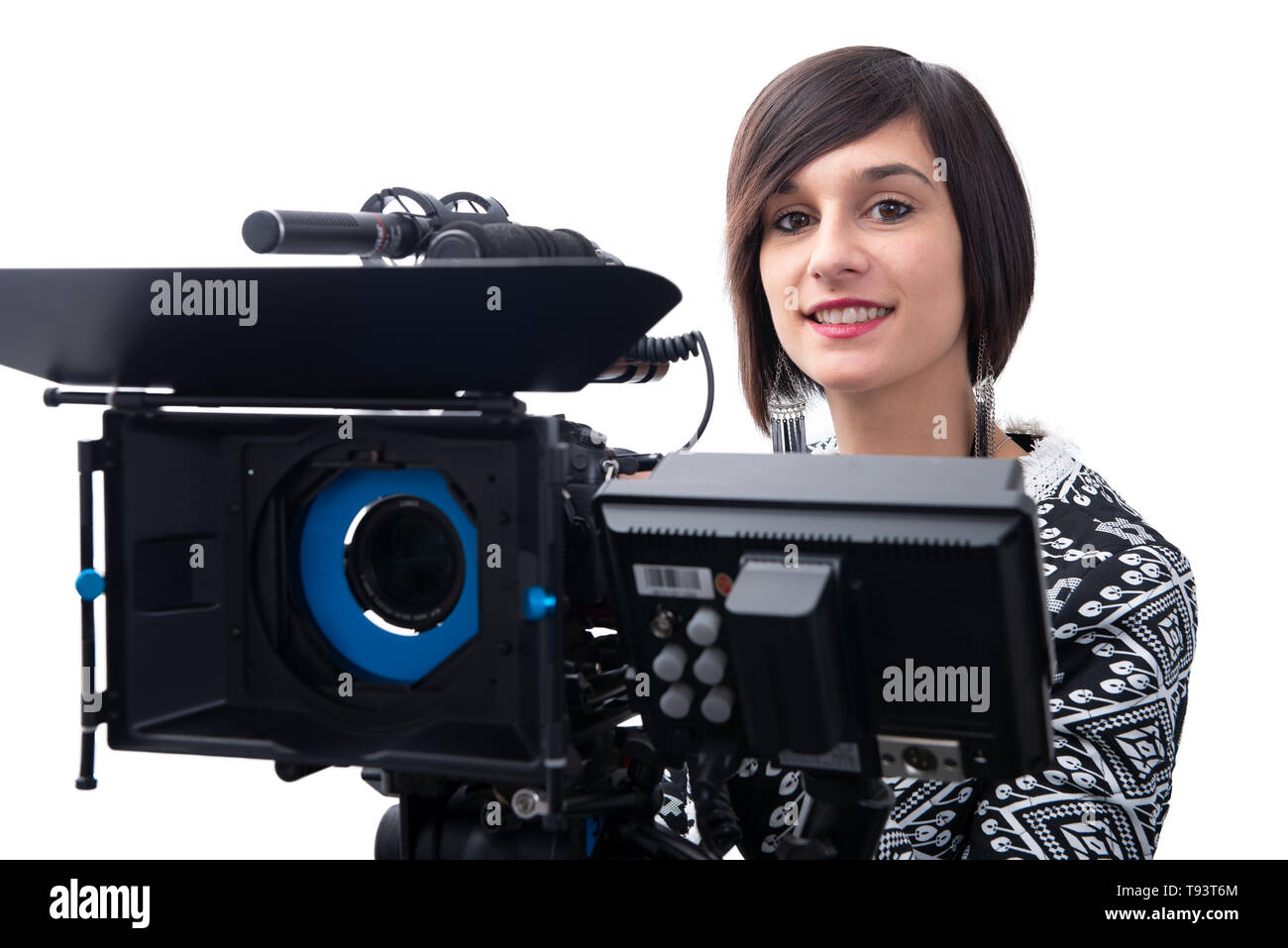 young woman with professional video camera, DSLR, isolated on white ...