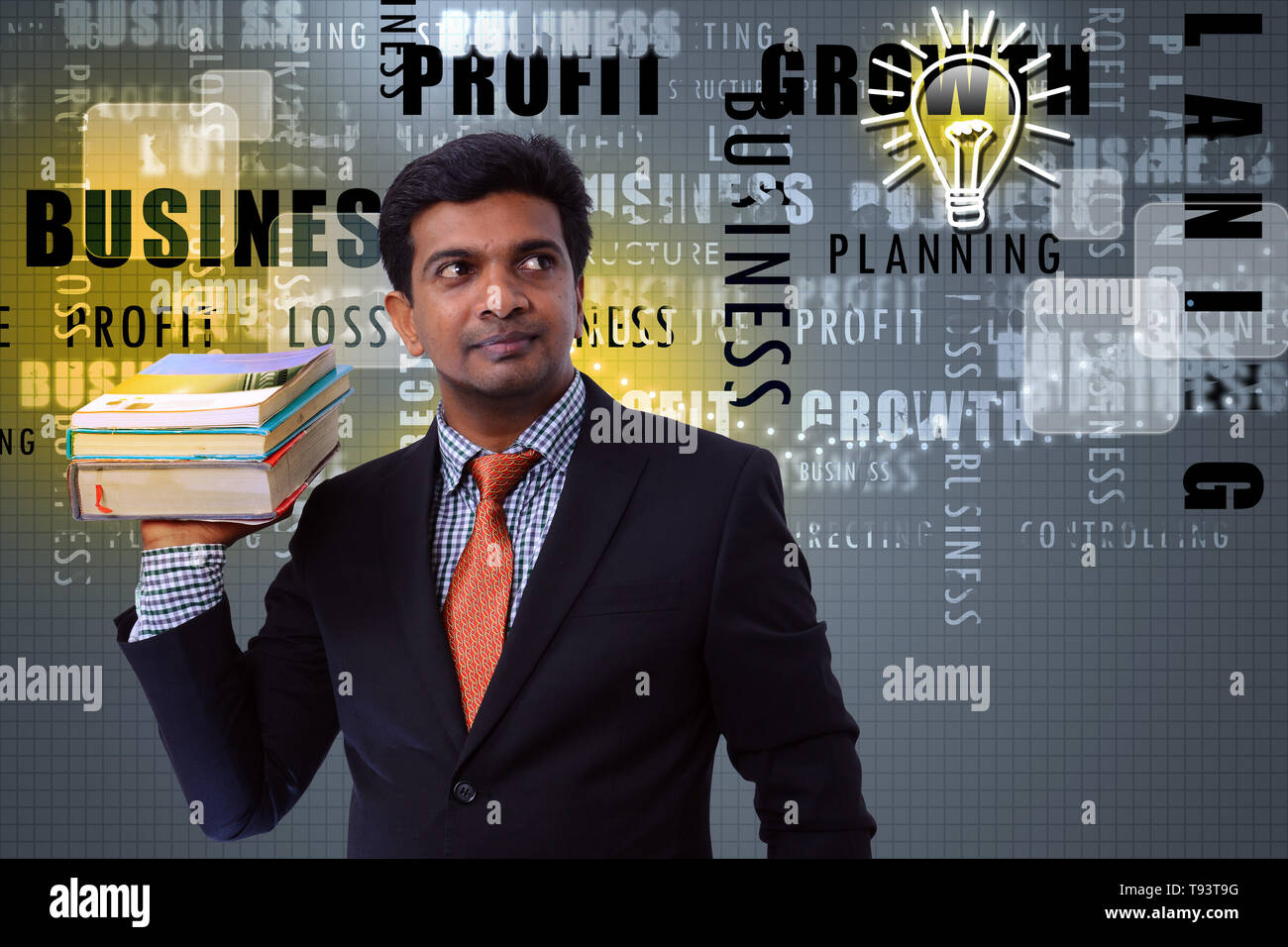 Business man with books Stock Photo - Alamy