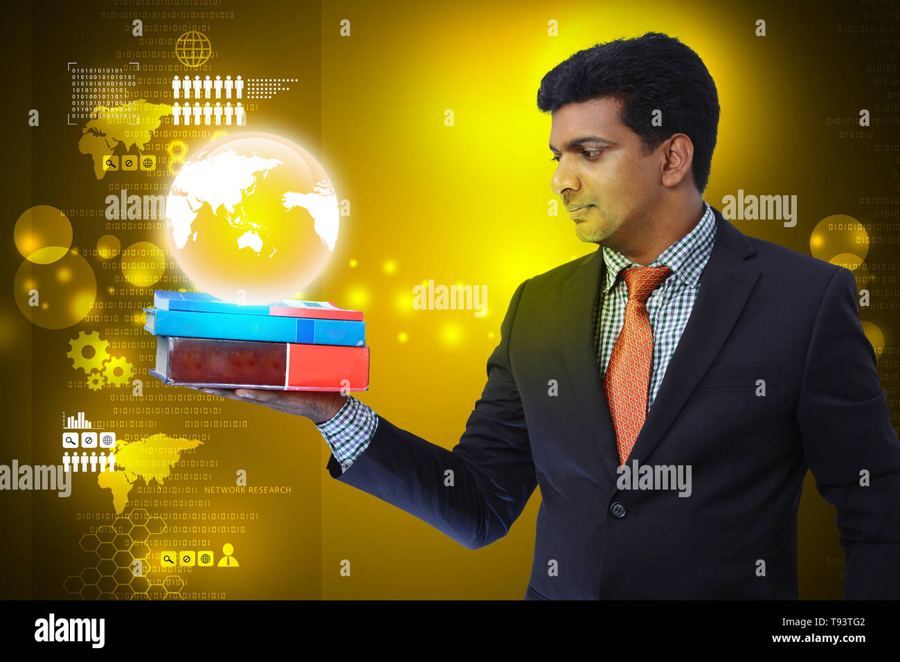 Business man with books and globe Stock Photo - Alamy