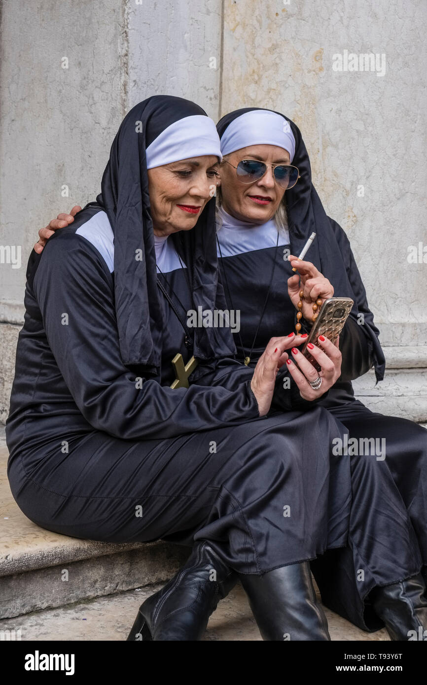 Nun smoking hi-res stock photography and images - Alamy