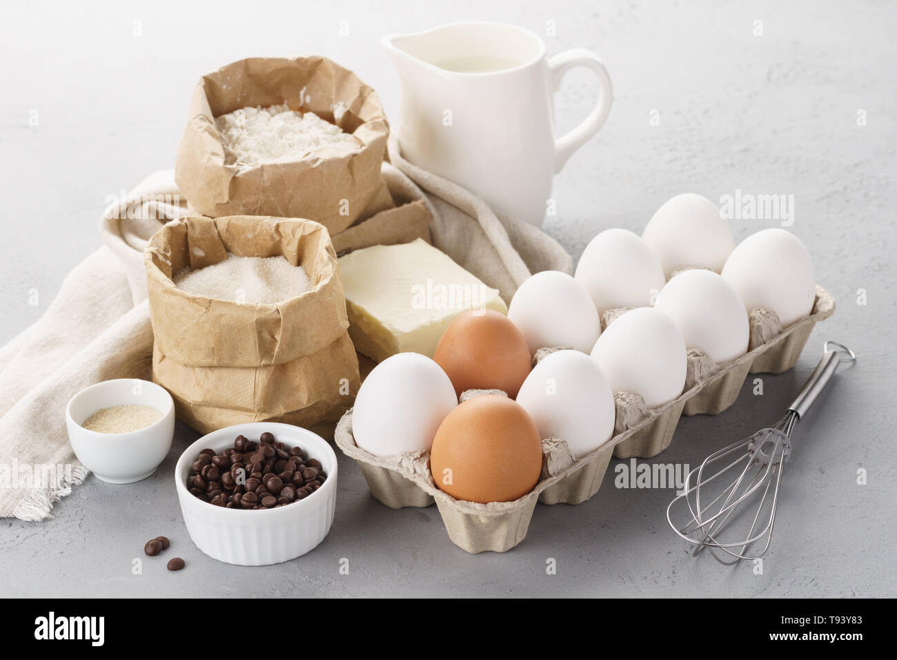 Various baking ingredients for sweet pastry. Dough recipe. Milk, flour ...