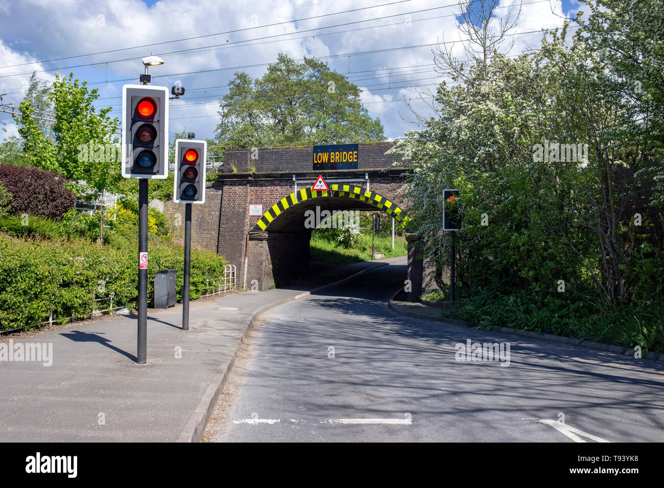 Low bridge warning sign on railway bridge in Cheshire UK Stock Photo ...
