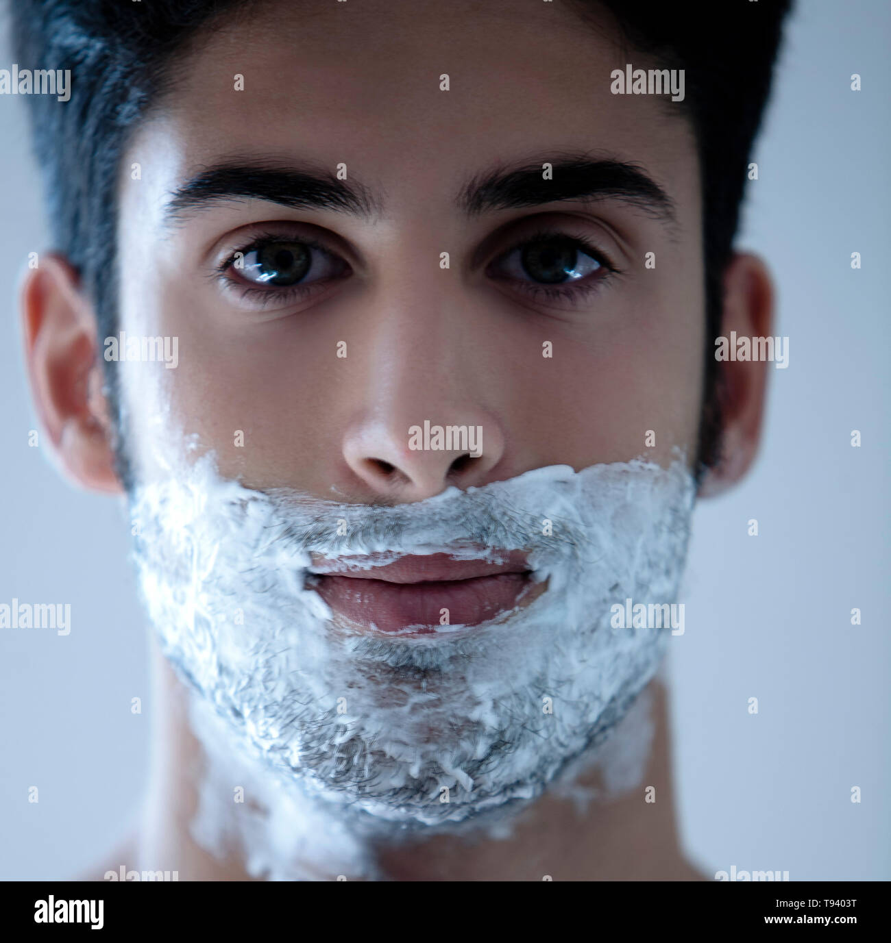 man with shaving foam on his face Stock Photo - Alamy