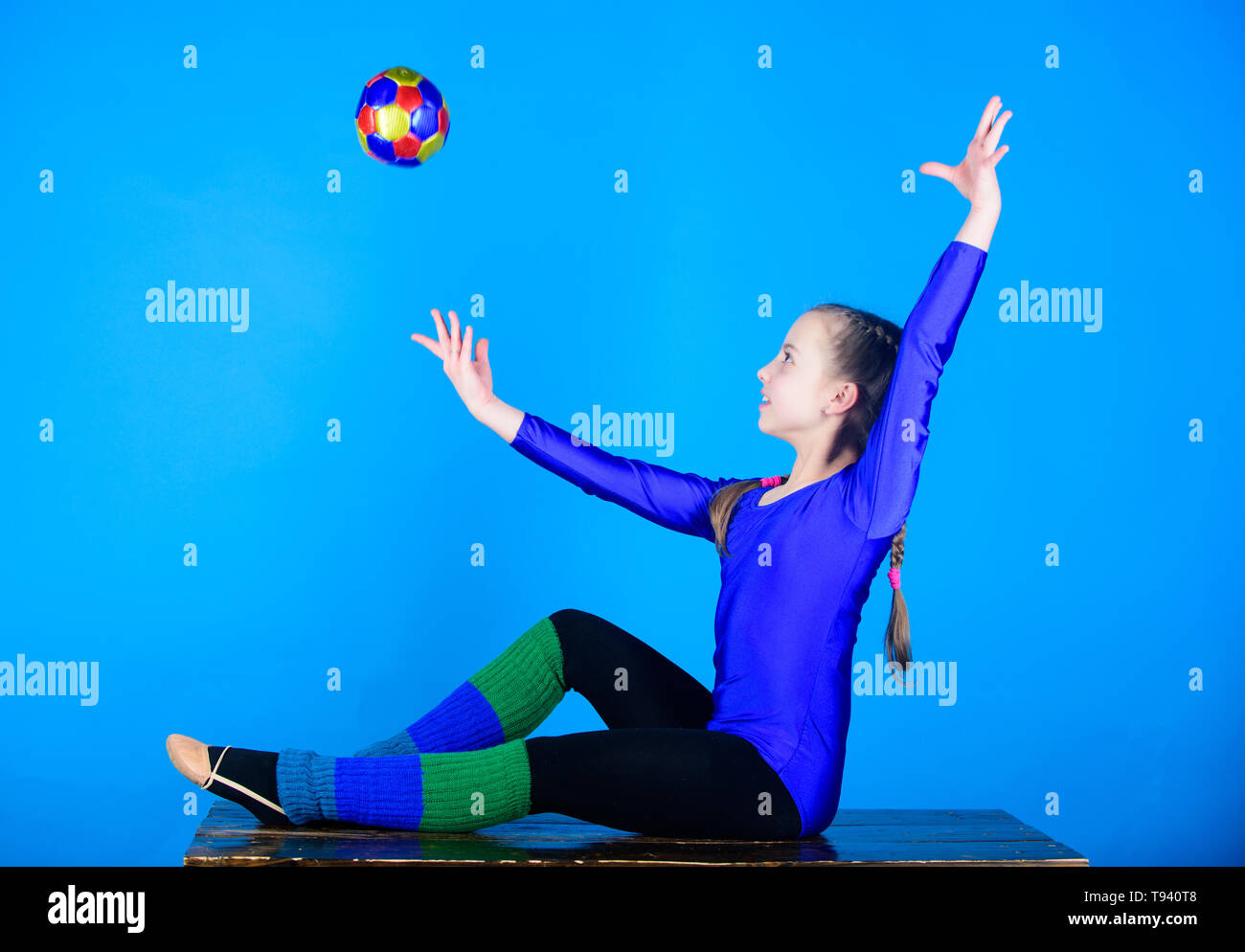 Flexible healthy body. Practicing gymnastics hard before performance ...