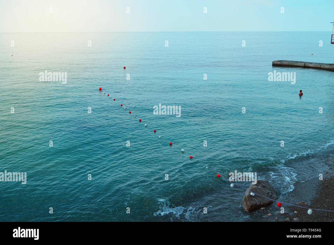 Separation buoys in the sea for safe swimming on the beach Stock Photo ...