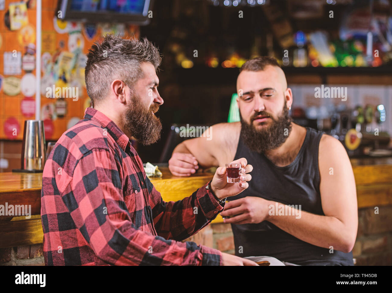 Friday relax in pub. Friends relaxing in pub. Drunk conversation ...