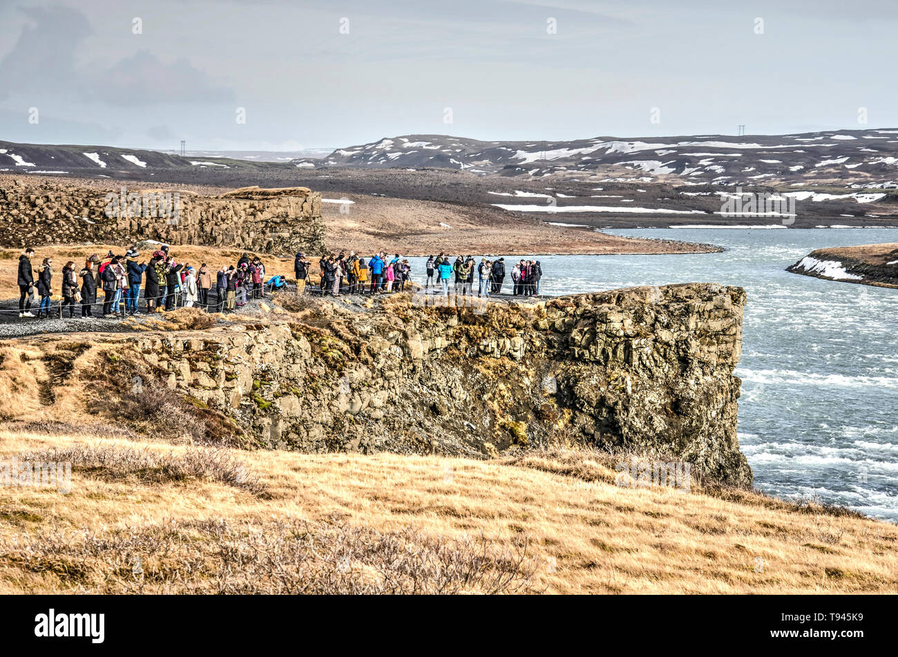 Grass is standing with a river with a waterfall hi-res stock ...