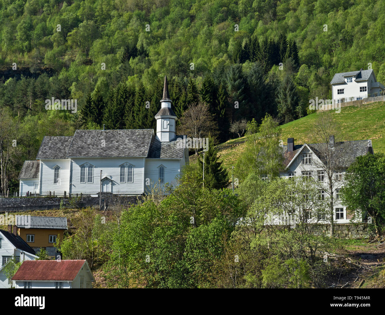 Norway, Hellesylt, village at the bottom of the snowy mountains, blue ...