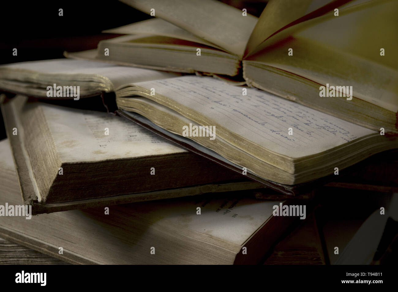 stack of old books with a handwritten diary Stock Photo - Alamy