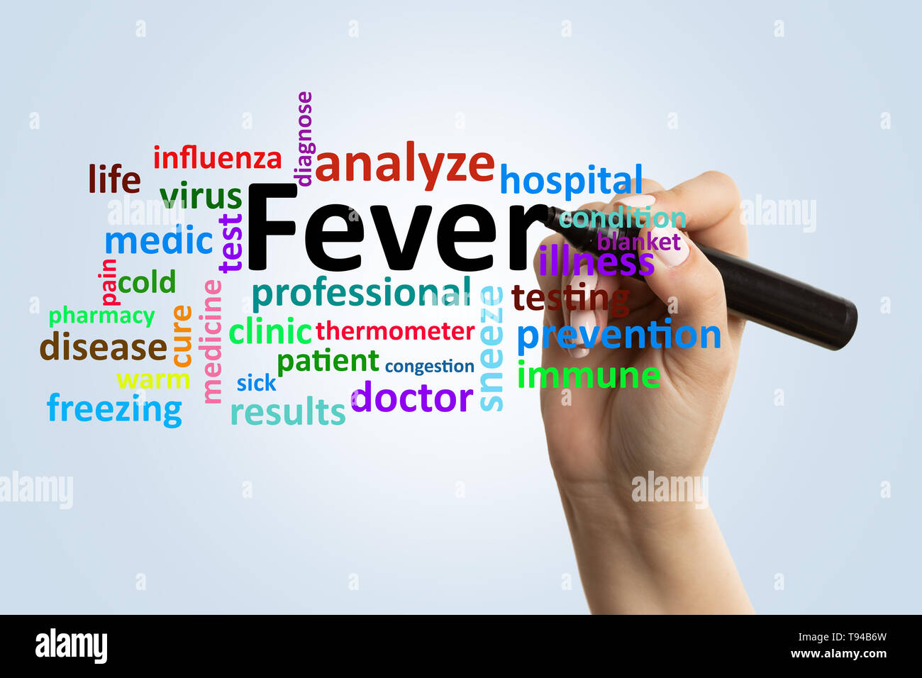 Woman medic writing fever text with marker on transparent glass board ...