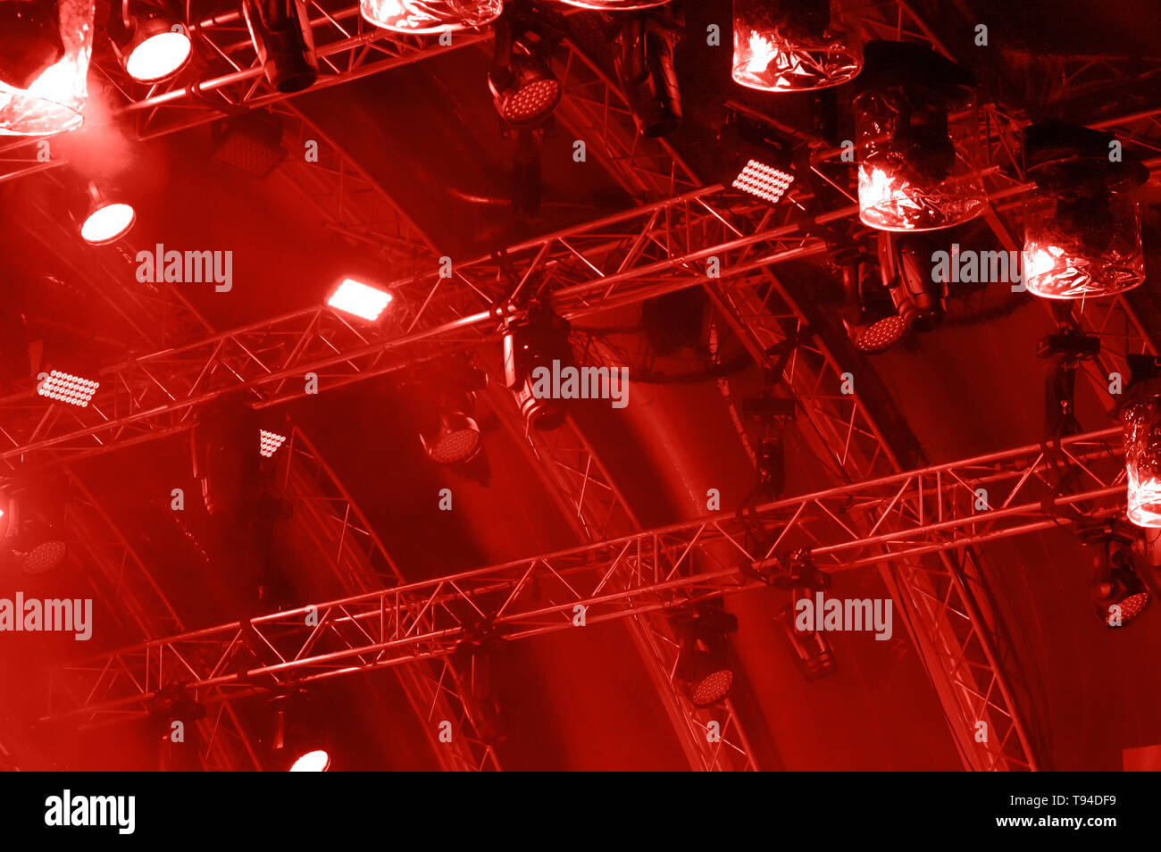 Colorful concert lighting. Red color concert lighting on a dark ...