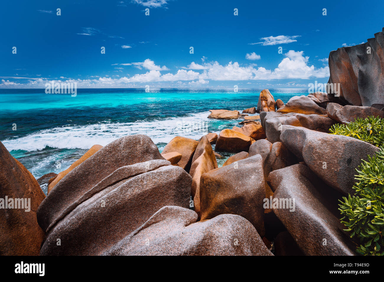 Beautifully granite boulders blue lagoon at grand anse beach hi-res ...