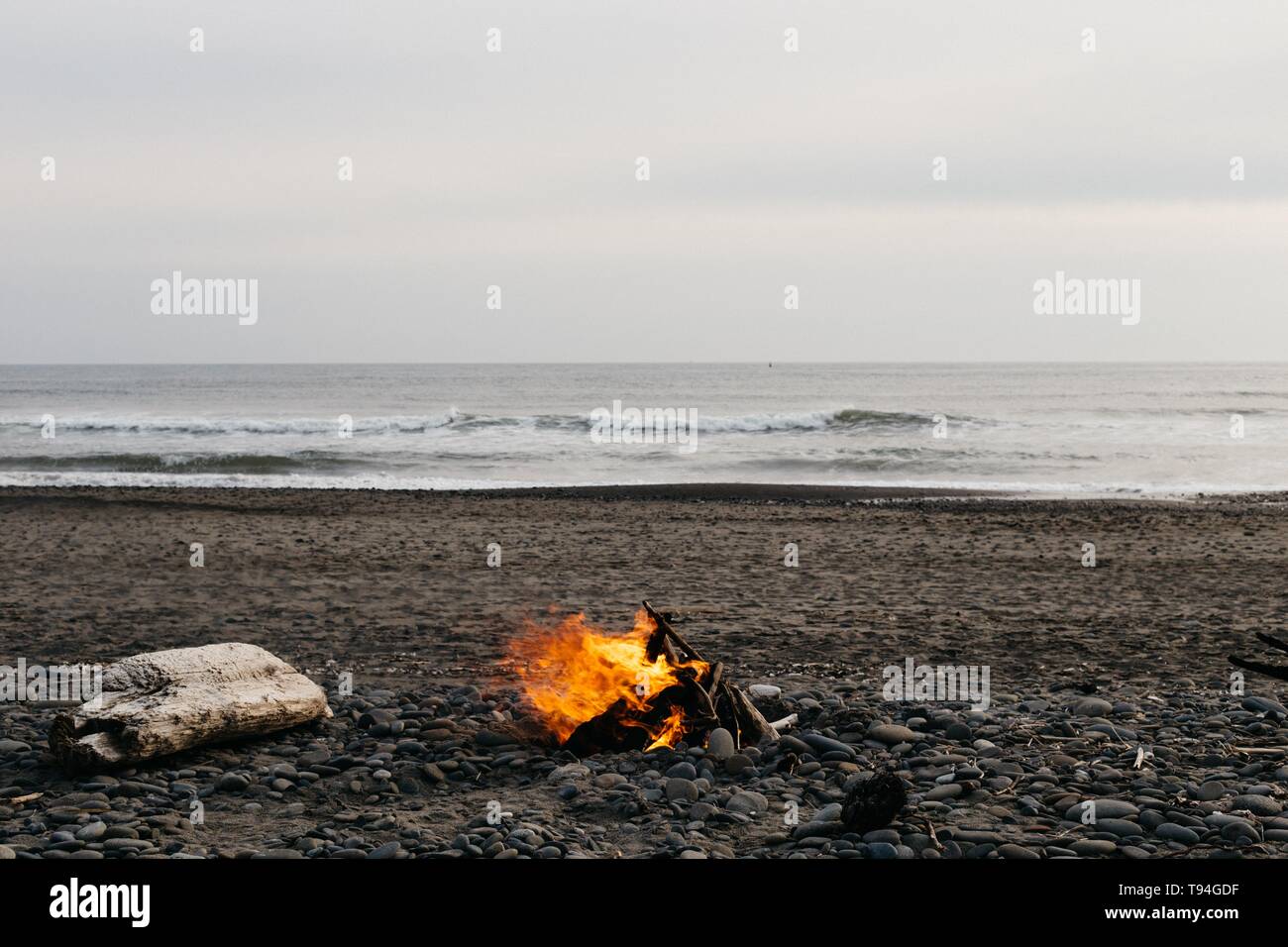 A bonfire at the beach Stock Photo - Alamy
