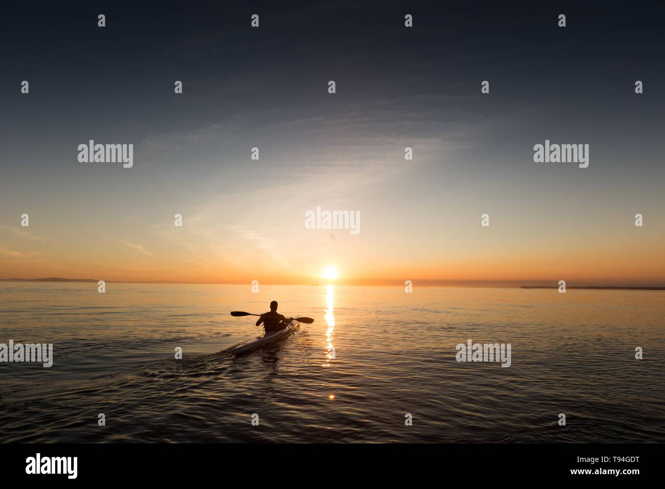 Man in a rowboat hi-res stock photography and images - Alamy
