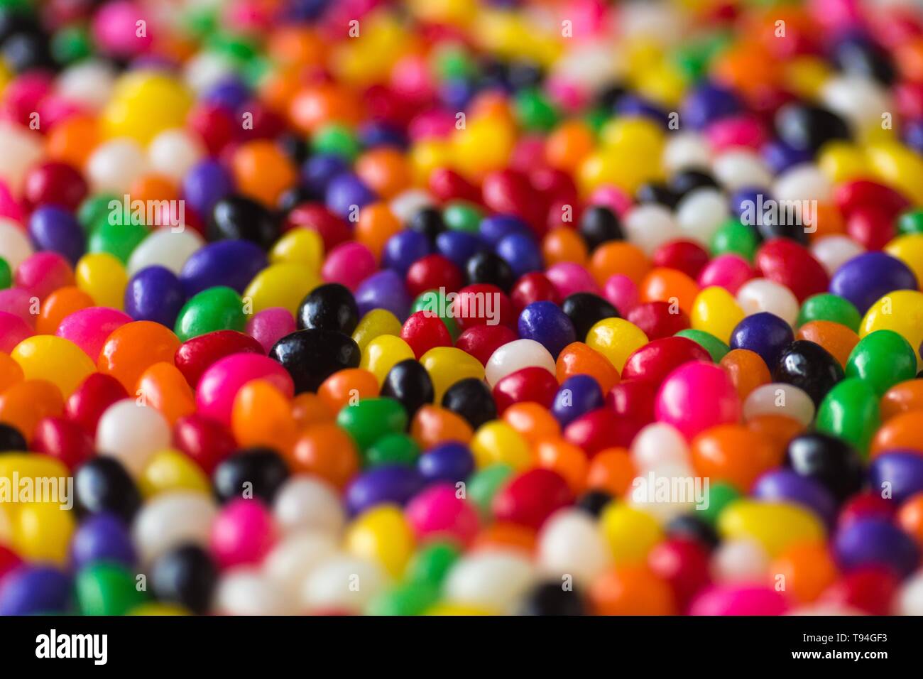 Closeup of colorful candy marbles in a pile Stock Photo - Alamy