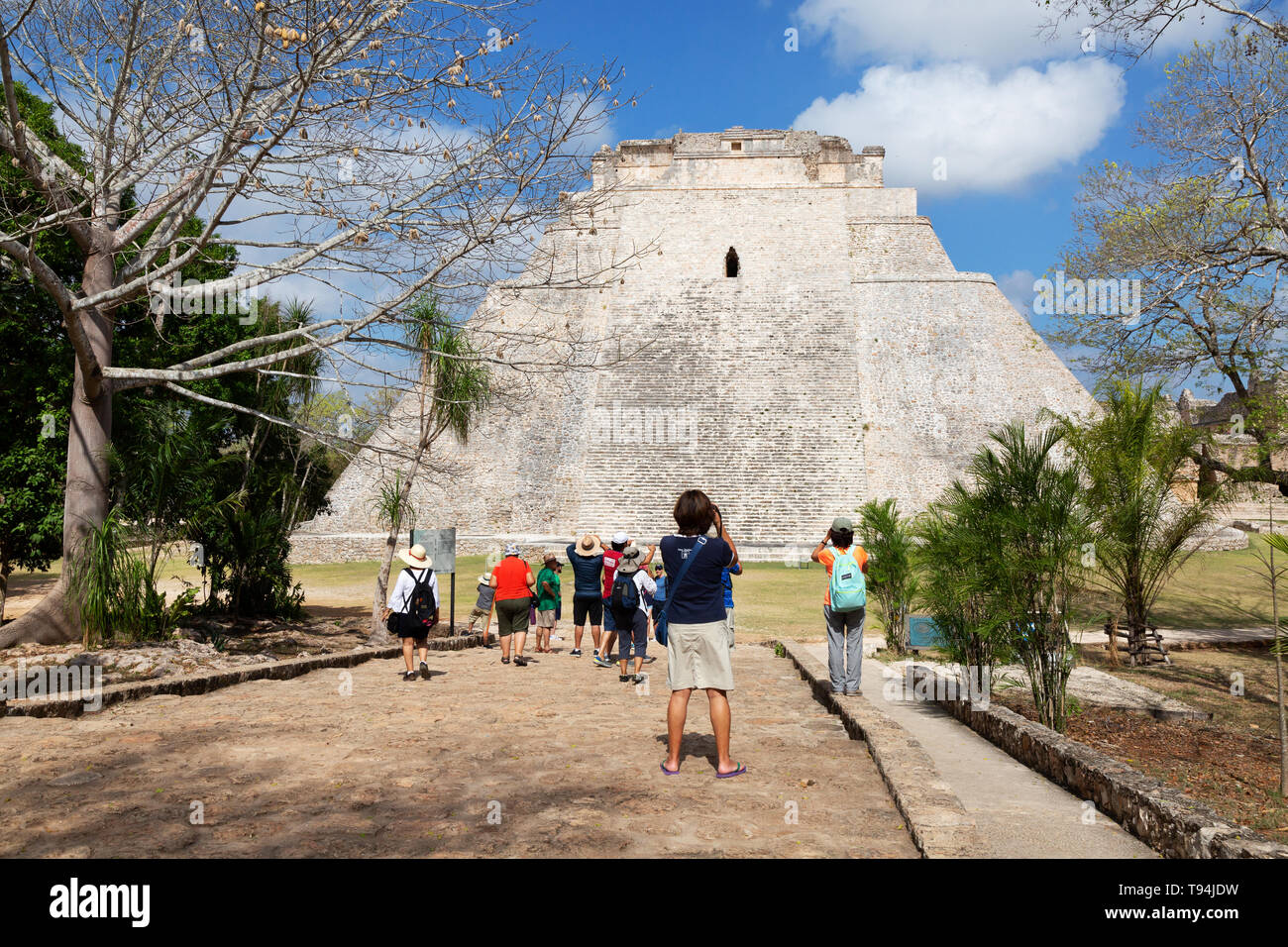 Latin America travel - people photographing the Pyramid of the Magician ...