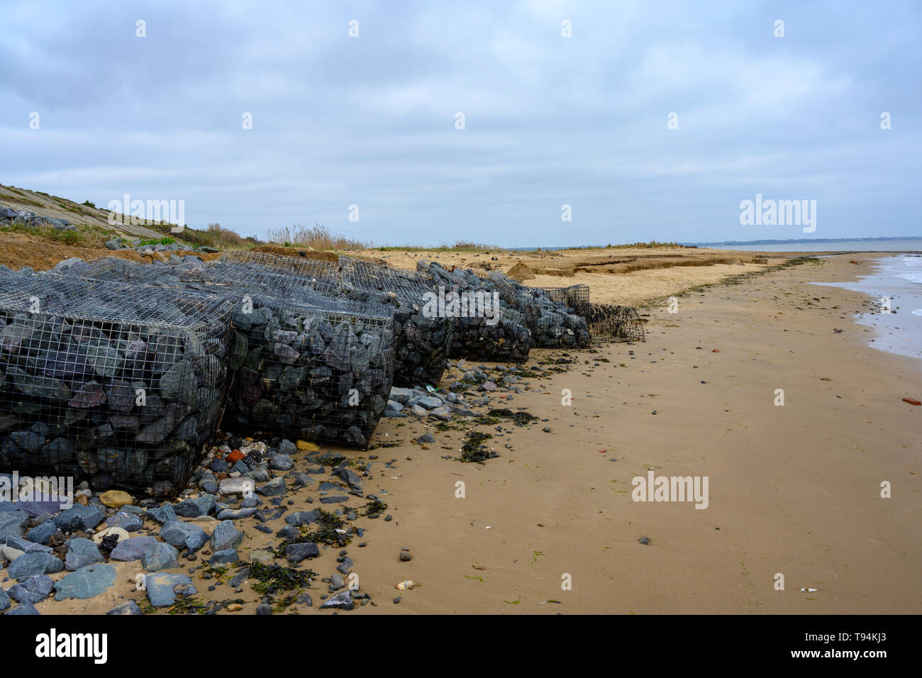 Rock armour protecting the coast against coastal erosion Stock Photo ...