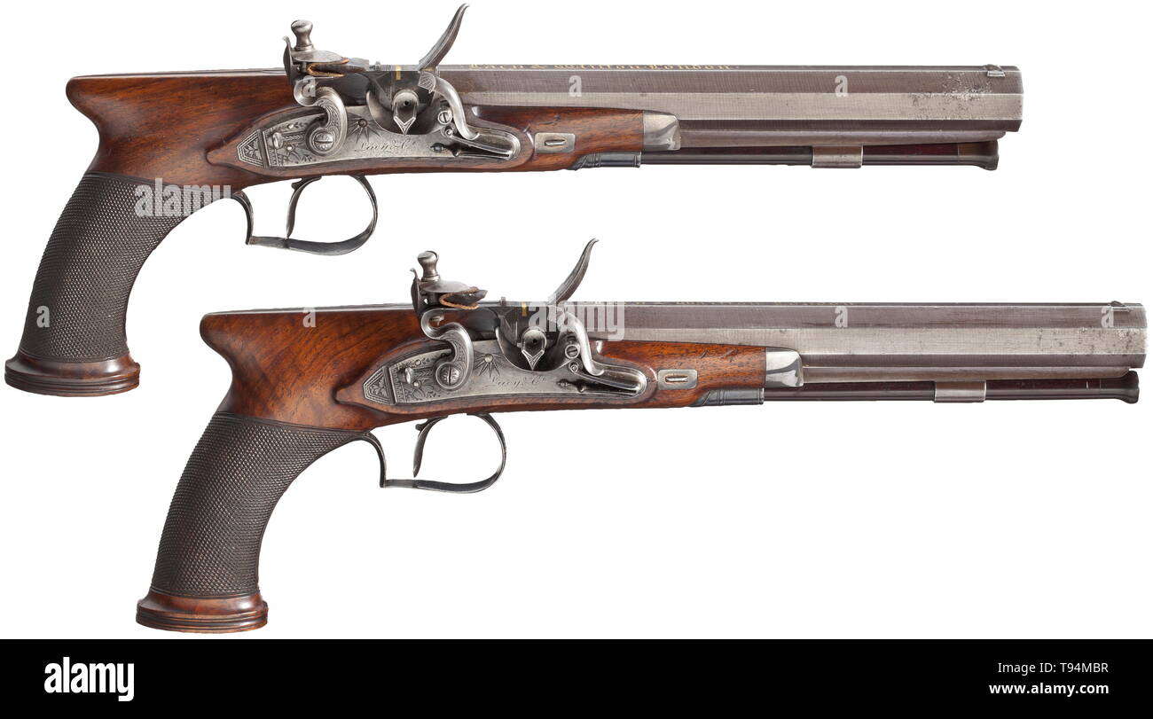 A pair of English flintlock pistols by the London gunsmiths Lacy ...