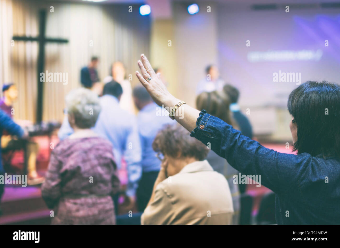 Worshiping church congregation service pray prayer hi-res stock ...