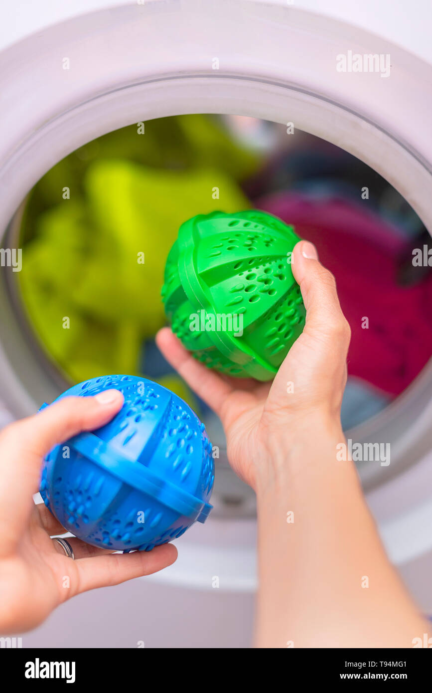 Woman washing machine eco hi-res stock photography and images - Alamy