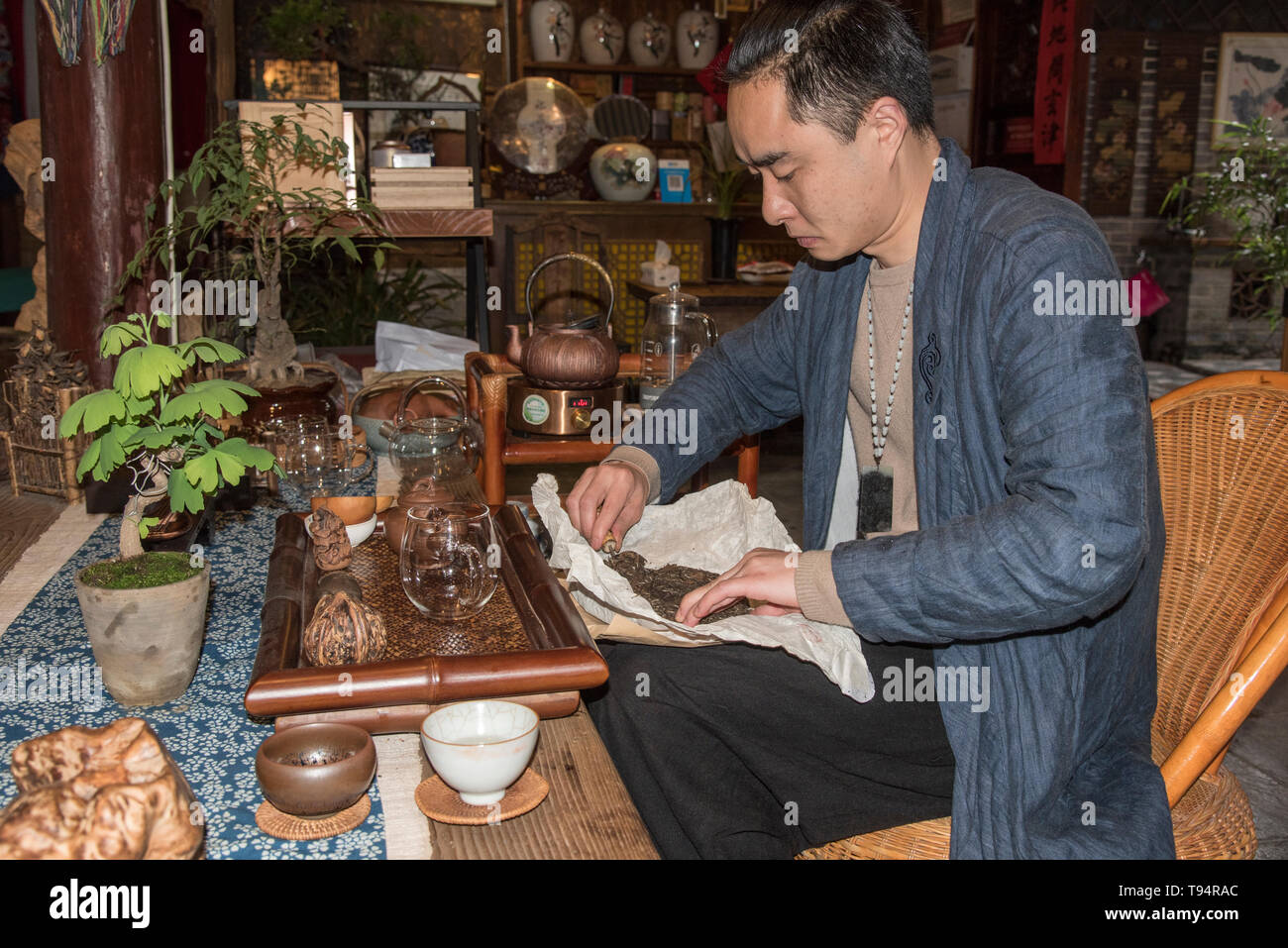 Chinese Tea Ceremony. Male server prepares the traditional tea ...