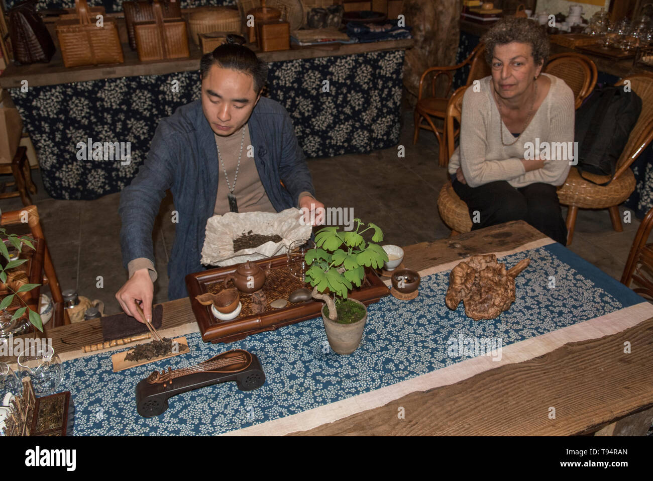 Chinese Tea Ceremony. Male server prepares the traditional tea ...