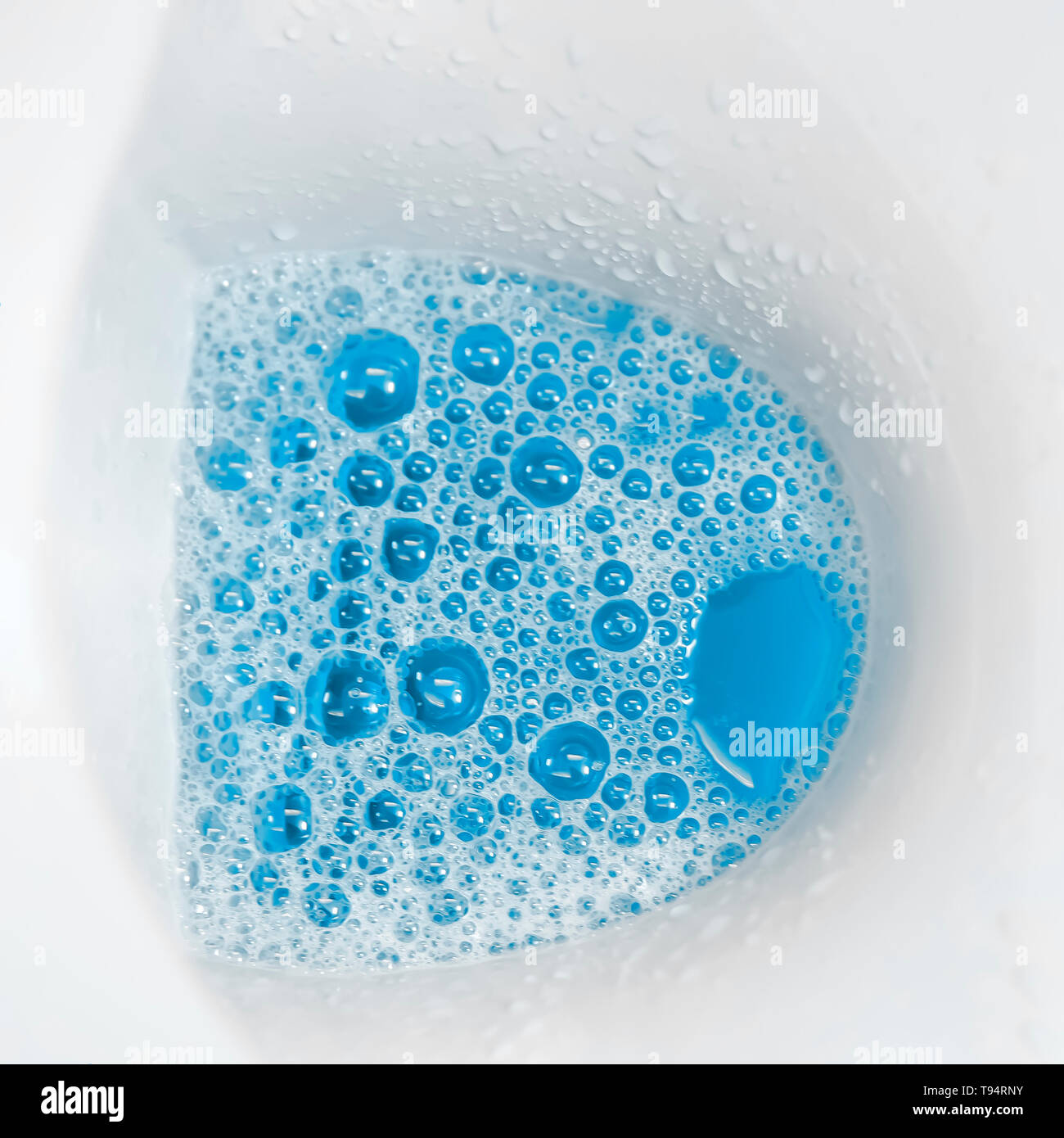 Bubbles on an Blue Liquid Stock Photo - Alamy