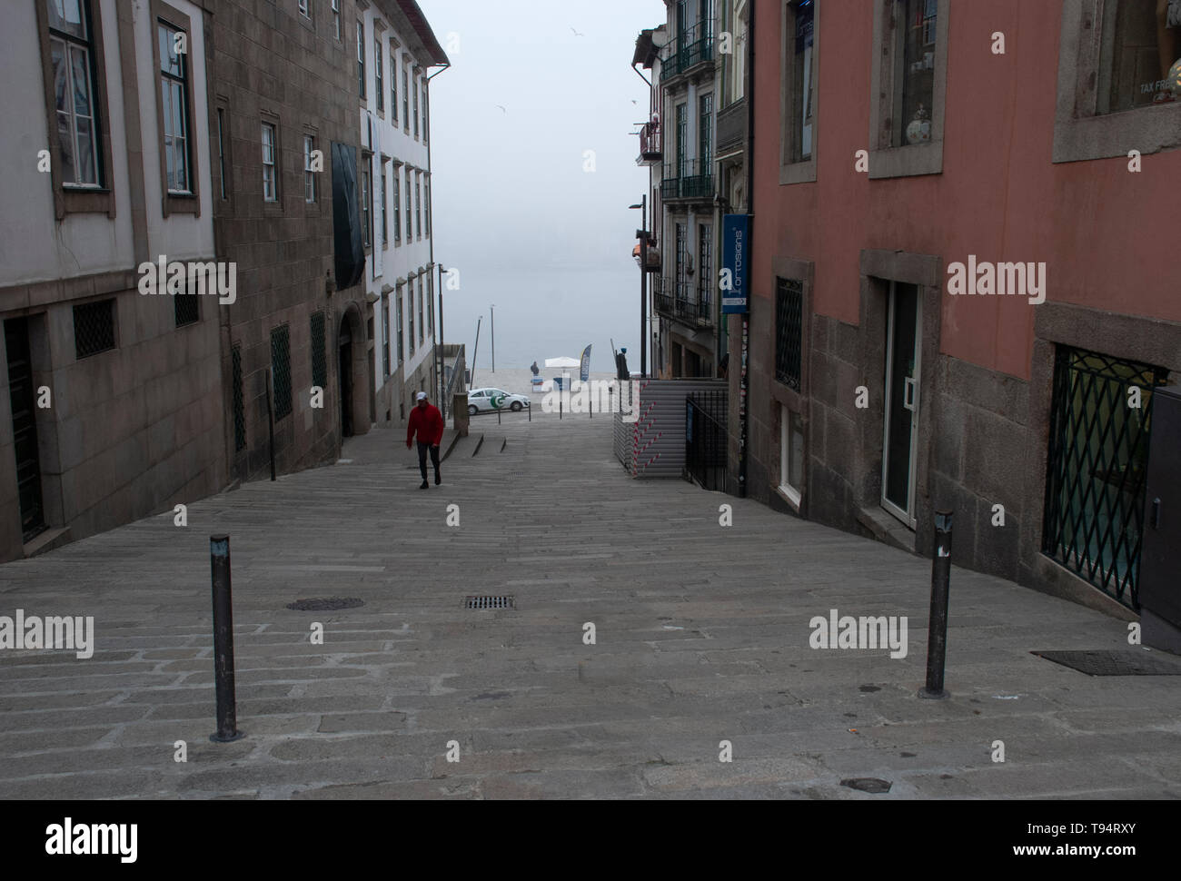 Porto street in mist Stock Photo - Alamy