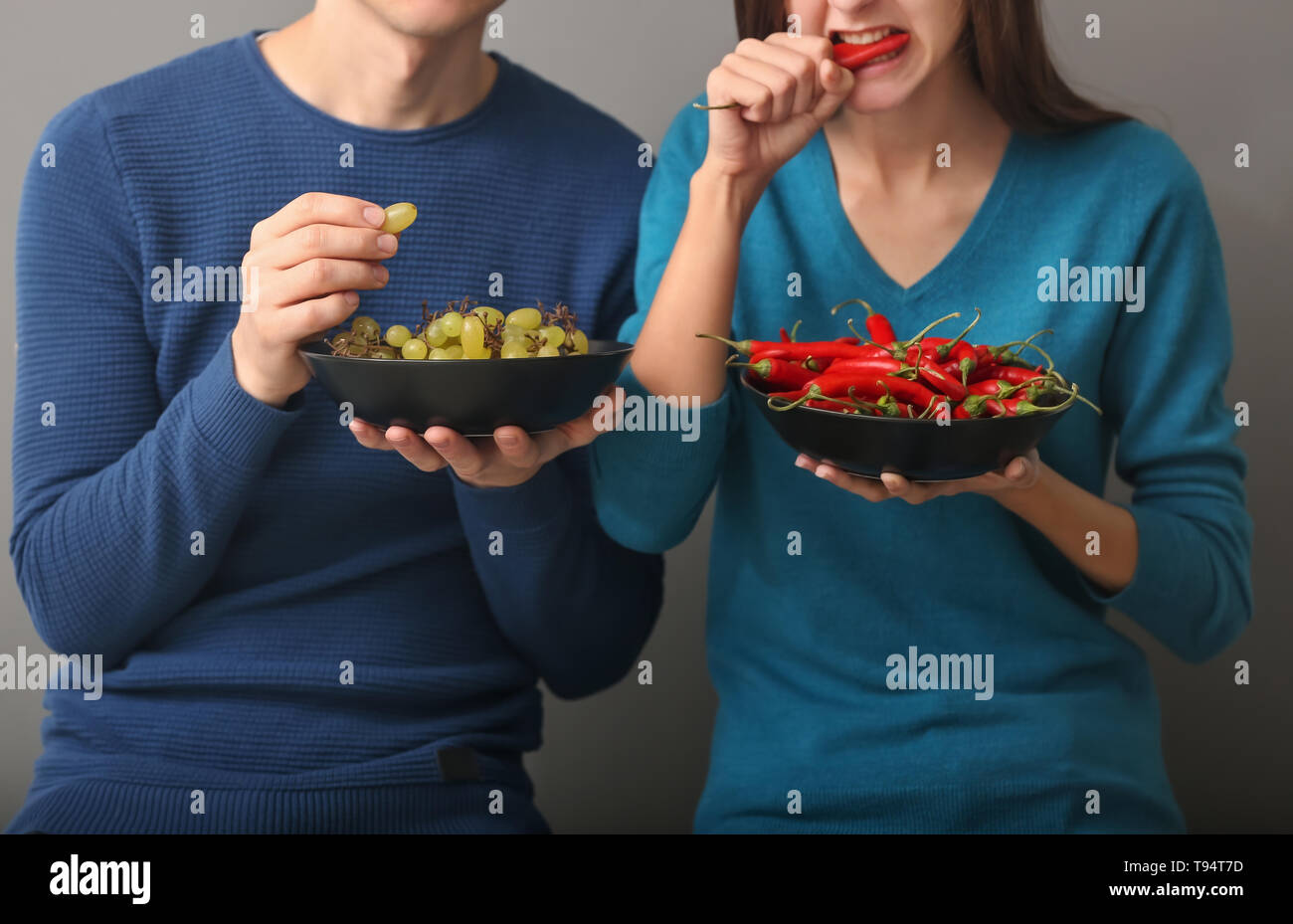 Man eating chilli hi-res stock photography and images - Alamy