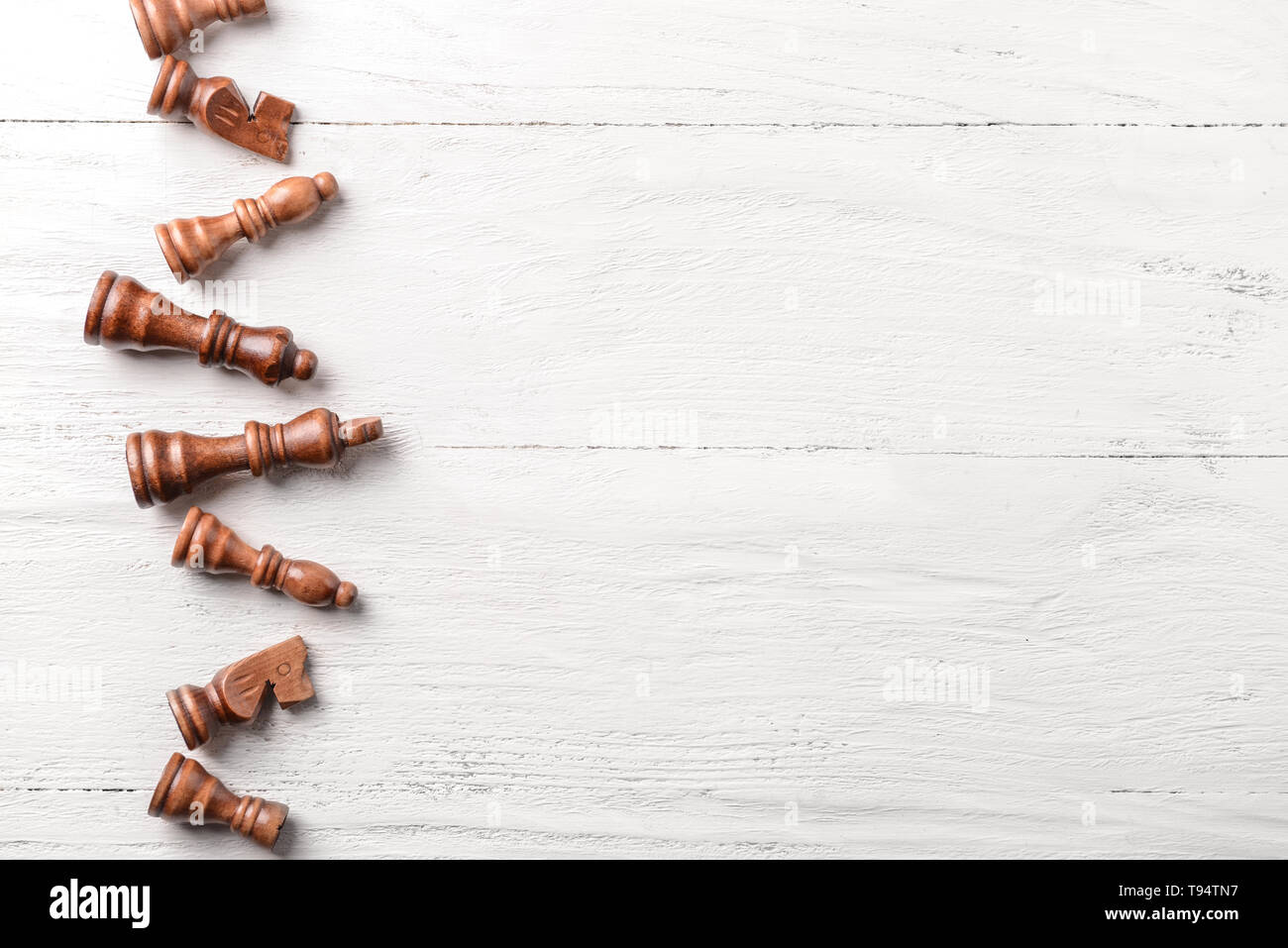 Flat lay composition with chess pieces on white wooden background Stock ...