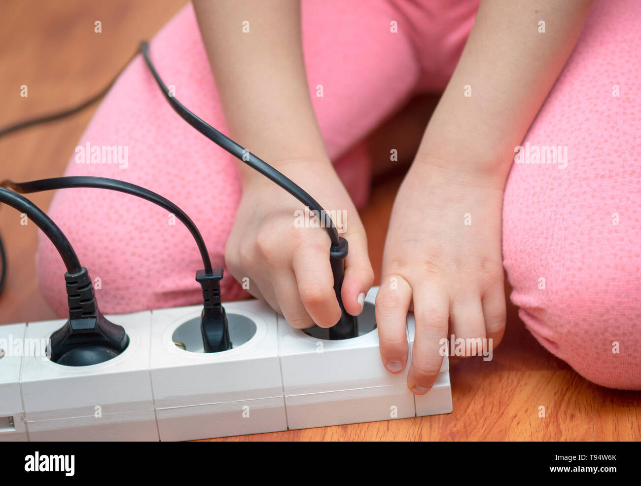Kid unplug cord hi-res stock photography and images - Alamy
