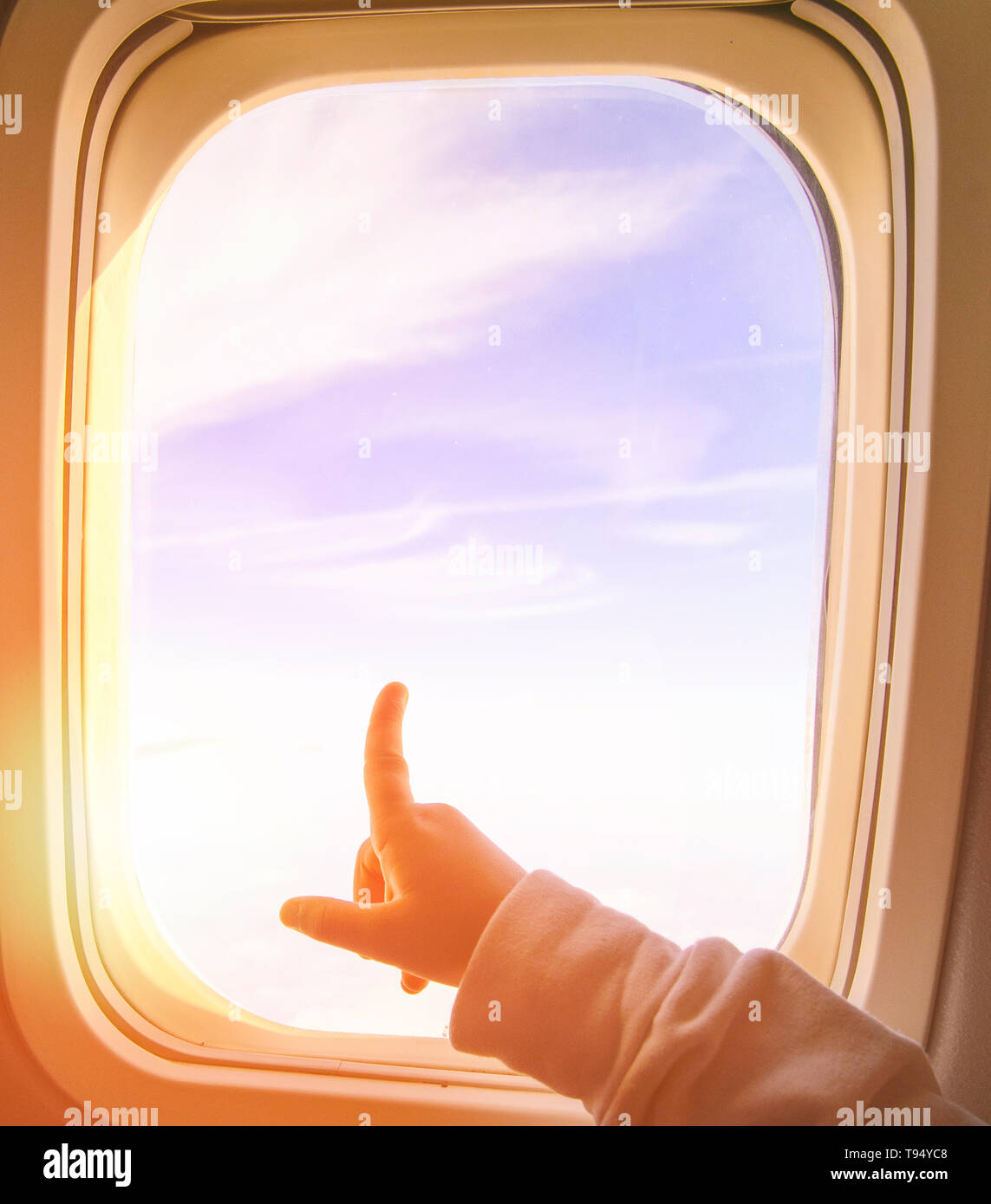 Little child point with his finger on airplane Stock Photo - Alamy
