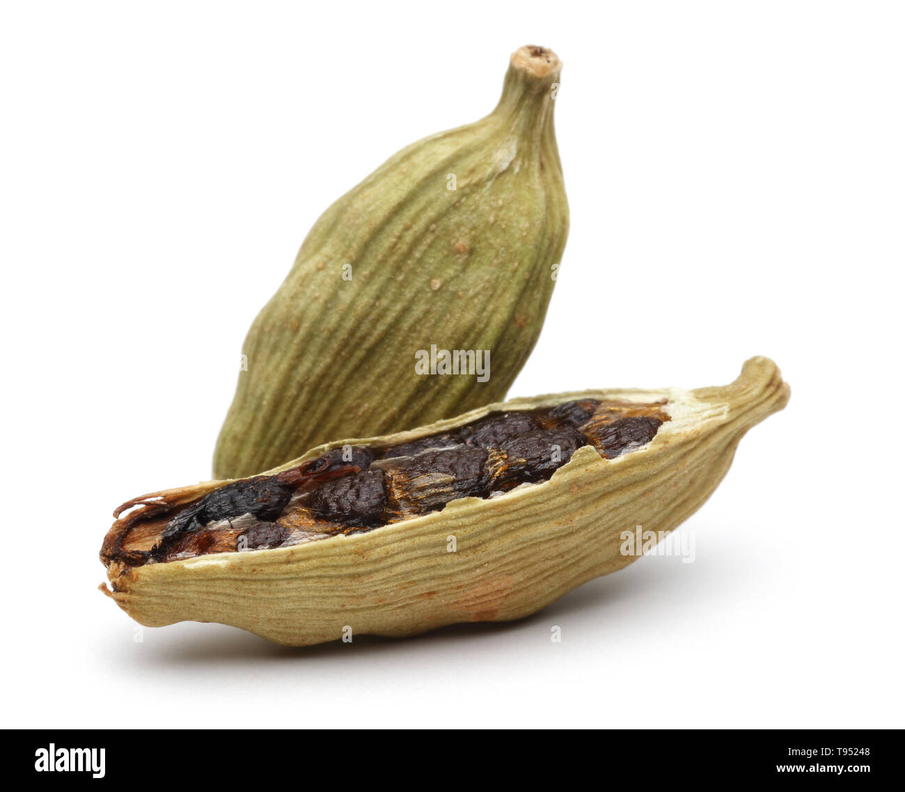 Cardamom pods and seeds isolated on white background Stock Photo - Alamy