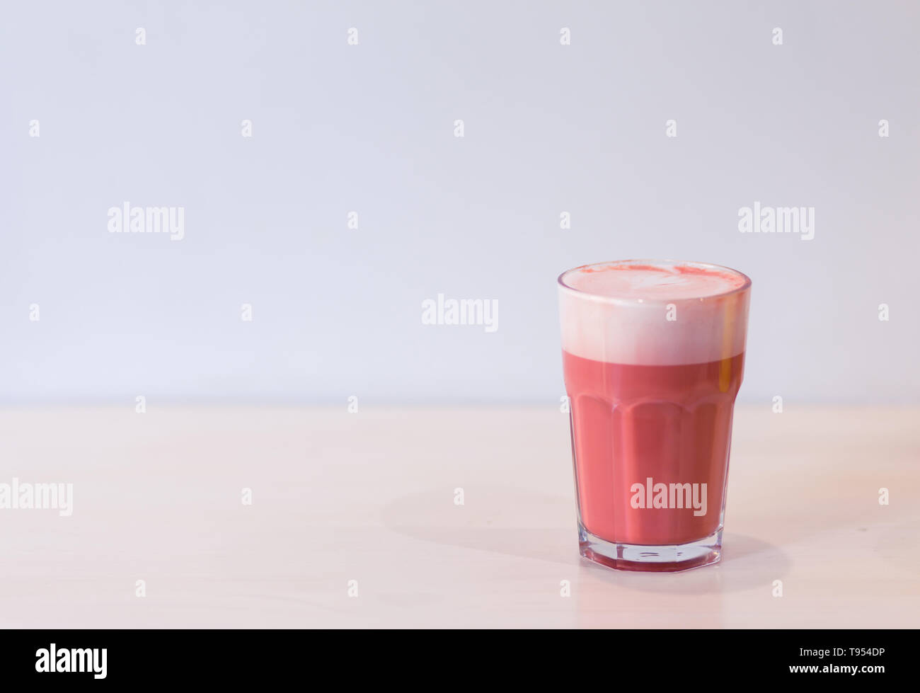 Pink, strawberry, sweet cappuccino on the white background with sticky ...