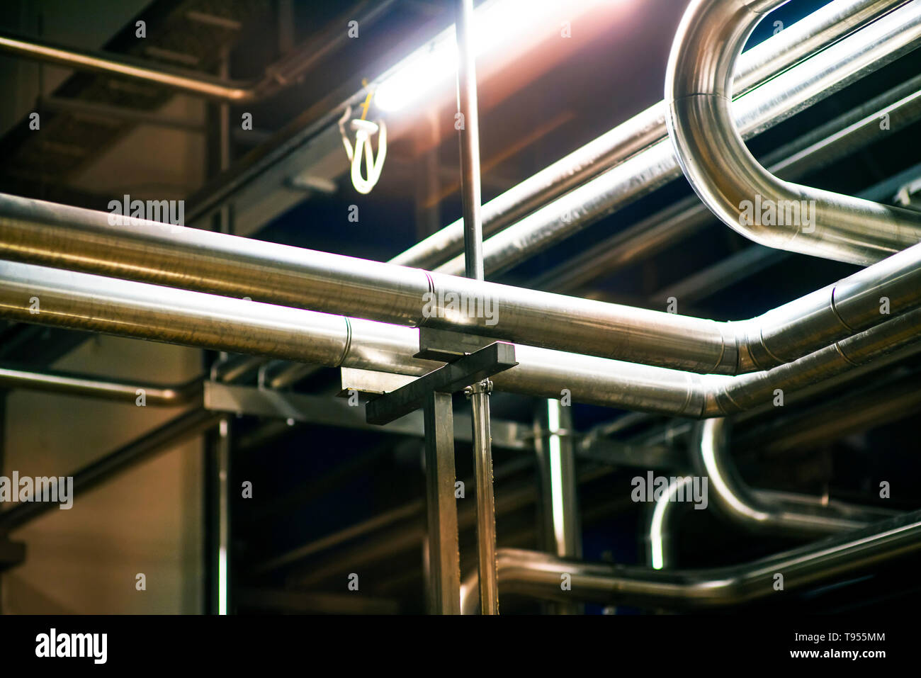 Stainless steel pipes in the factory. Construction on food production ...