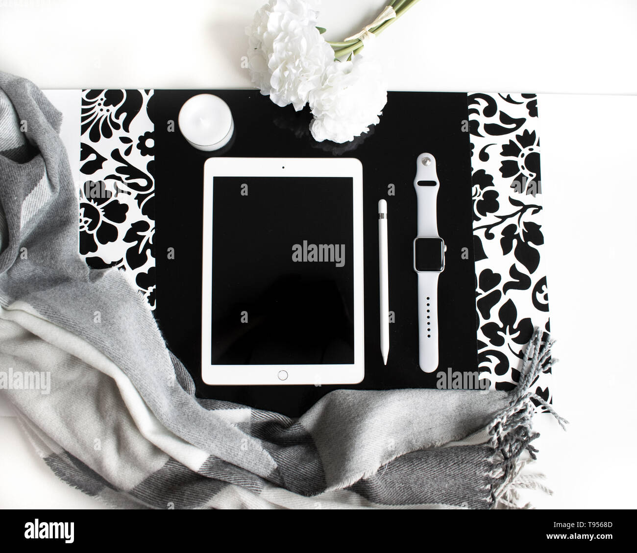 flat lay: Apple products on black and white background Stock Photo - Alamy