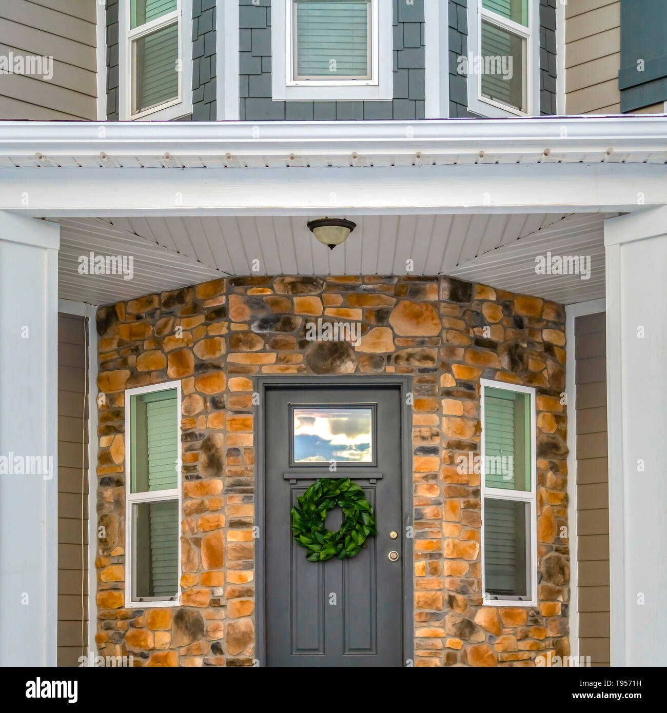 Clear Square Glass paned front door and windows on the half hexagon ...