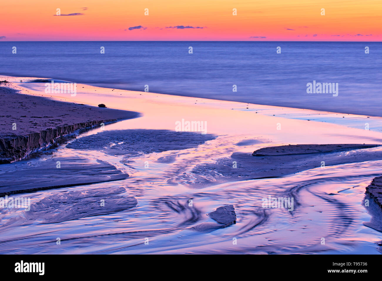 sandy shoreline along the Gulf of St. Lawrence at dusk Cable Head ...