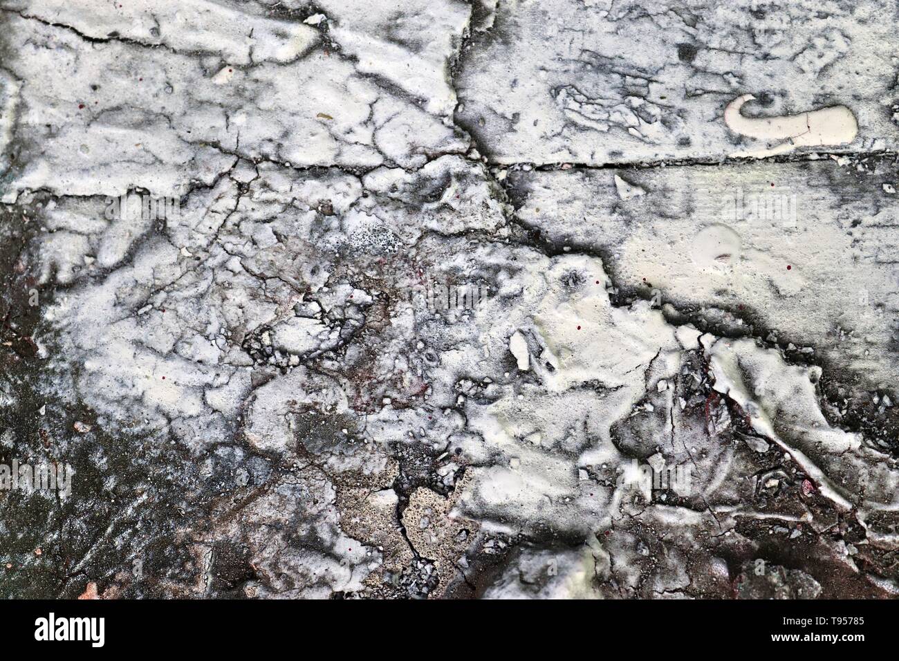 Close up texture of colorful graffiti paint on old cracked concrete ...