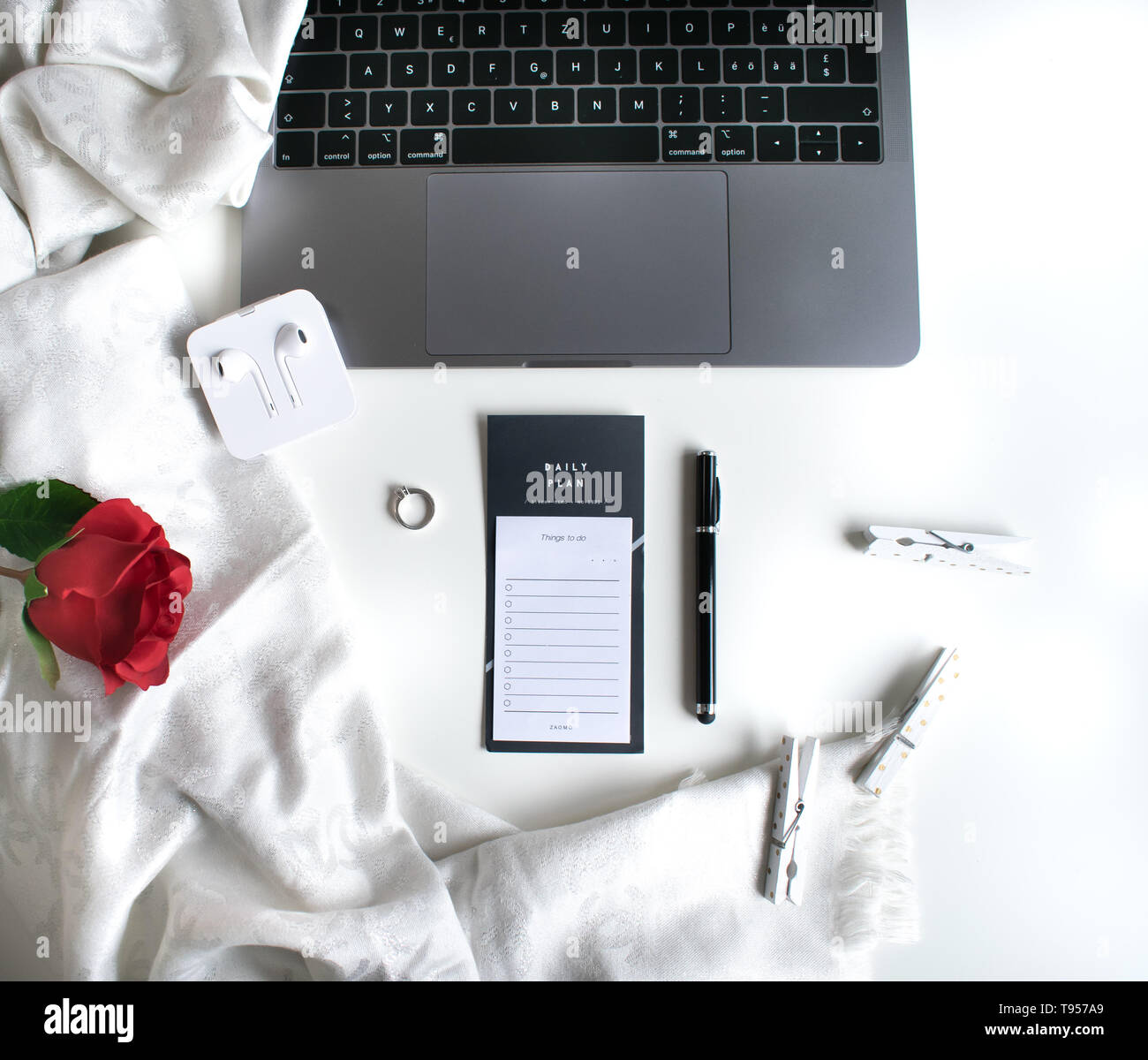 flat lay: Apple products on black and white background Stock Photo - Alamy