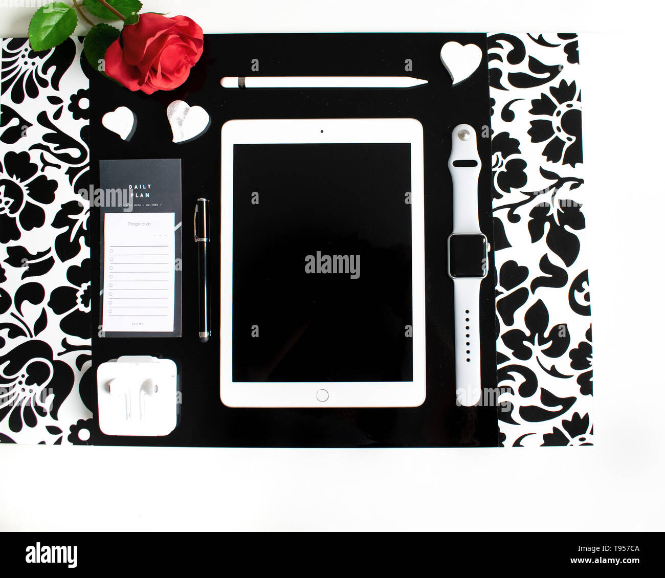 flat lay: Apple products on black and white background Stock Photo - Alamy