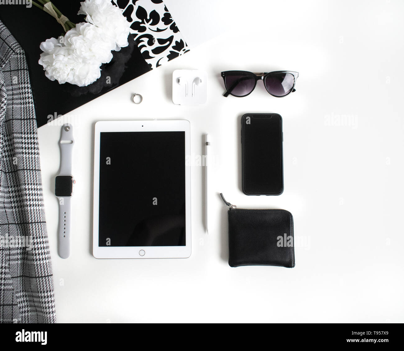 flat lay: Apple products on black and white background Stock Photo - Alamy