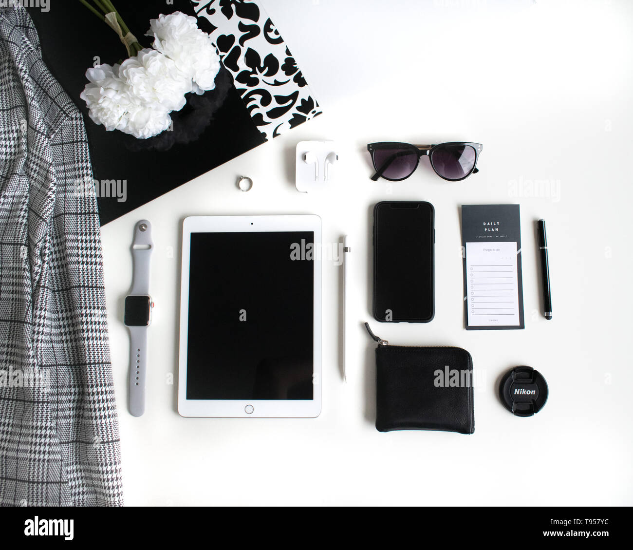 flat lay: Apple products on black and white background Stock Photo - Alamy